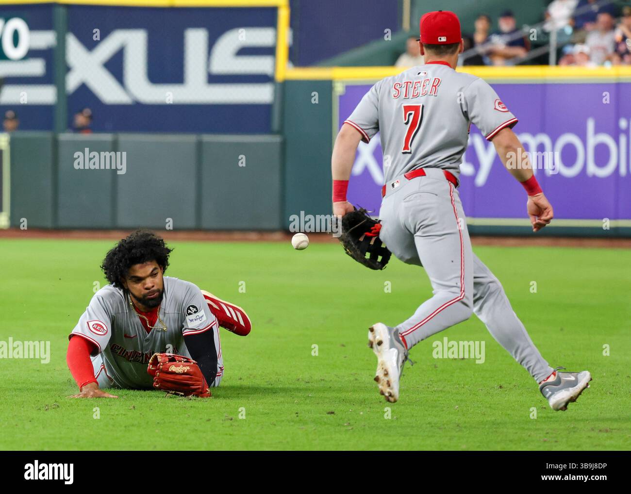 HOUSTON, TX - MAY 09: (left to right) Cincinnati Reds right fielder ...