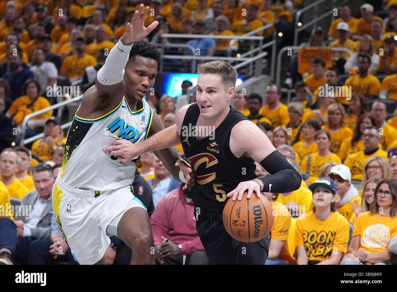 Cleveland Cavaliers guard Sam Merrill (5) dribbles the ball past ...