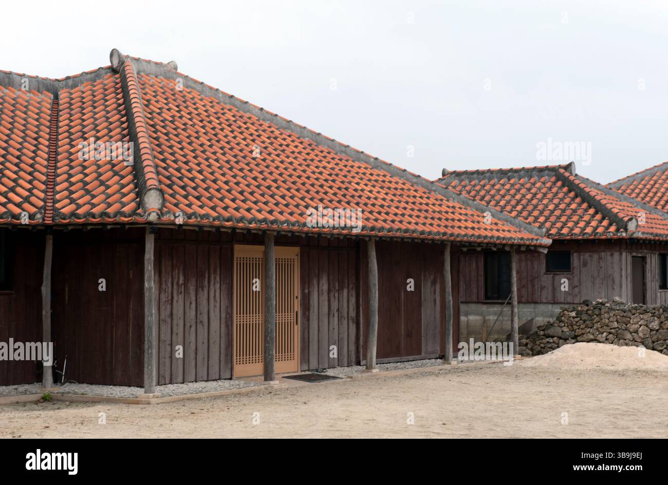 Typical single-story, single-family residence on Taketomi Island with ...