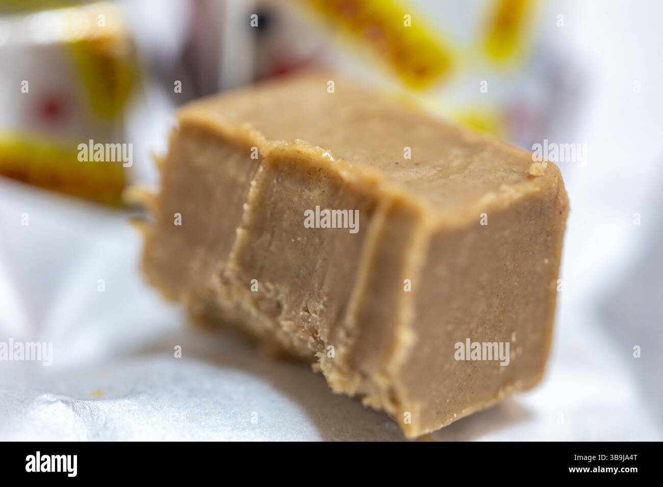 Traditional and original peanut candy known in Brazil as Dadinho. Made ...