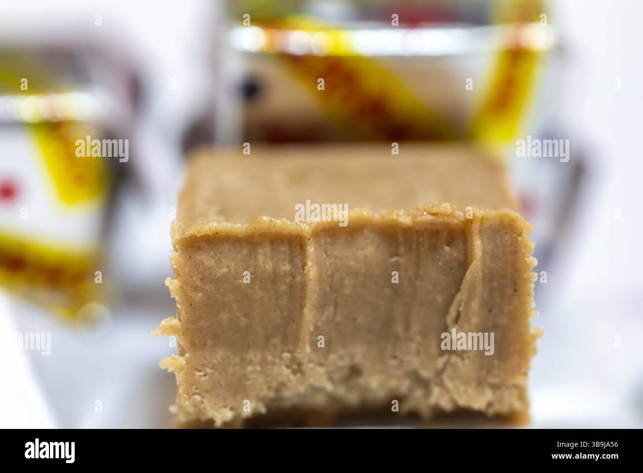 Traditional and original peanut candy known in Brazil as Dadinho. Made ...