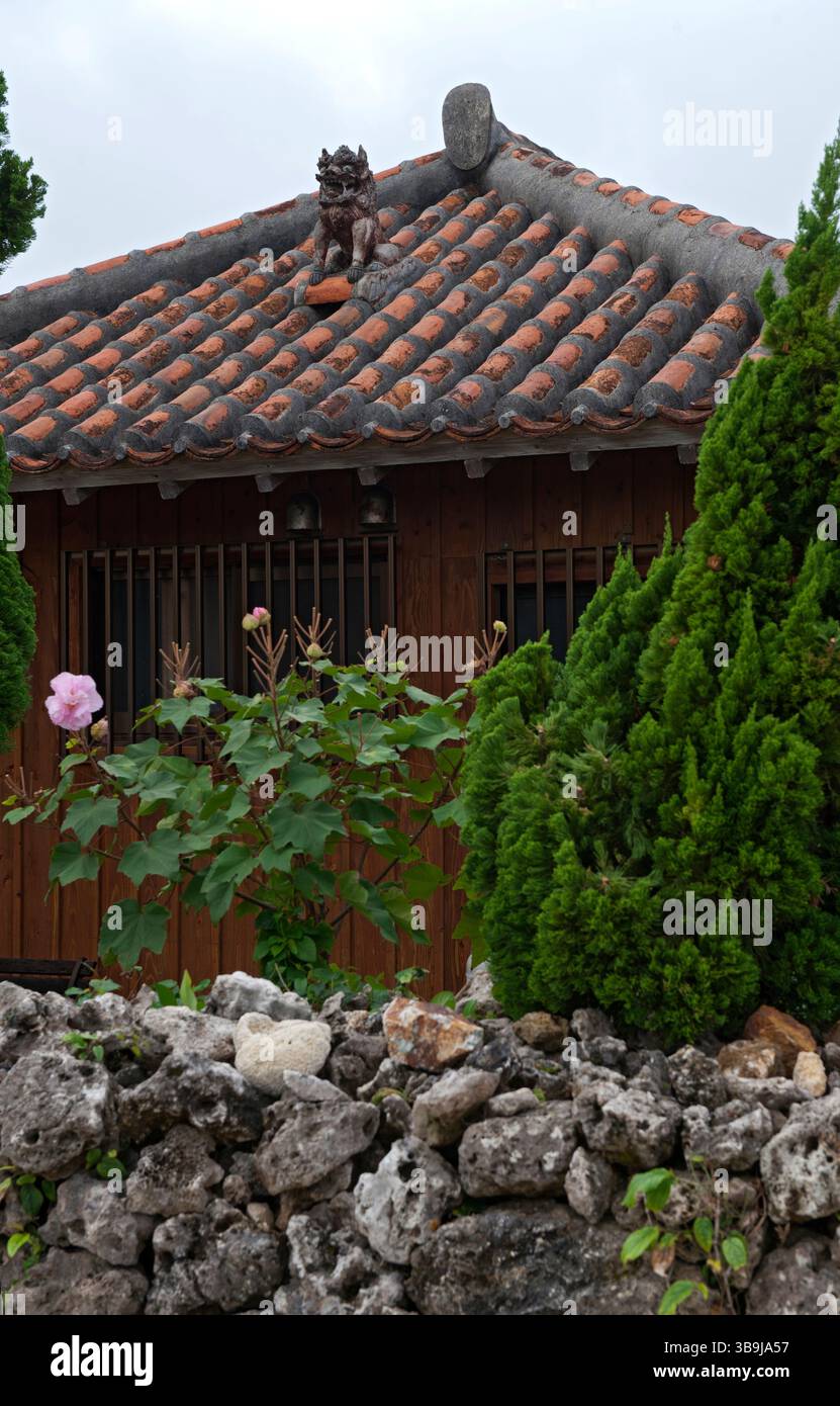 Typical single-story, single-family residence on Taketomi Island with ...