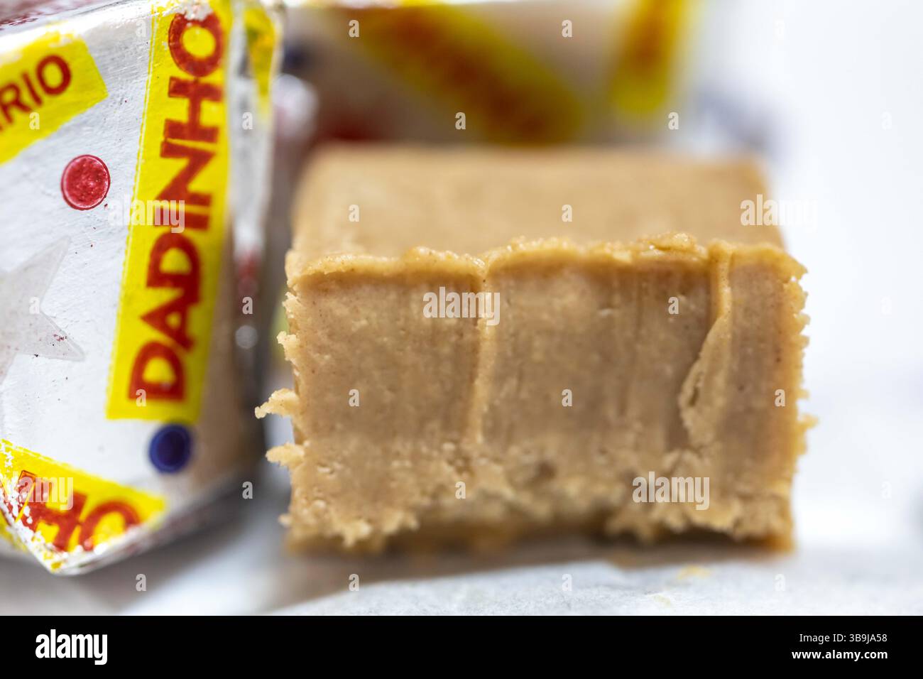 Traditional and original peanut candy known in Brazil as Dadinho. Made ...