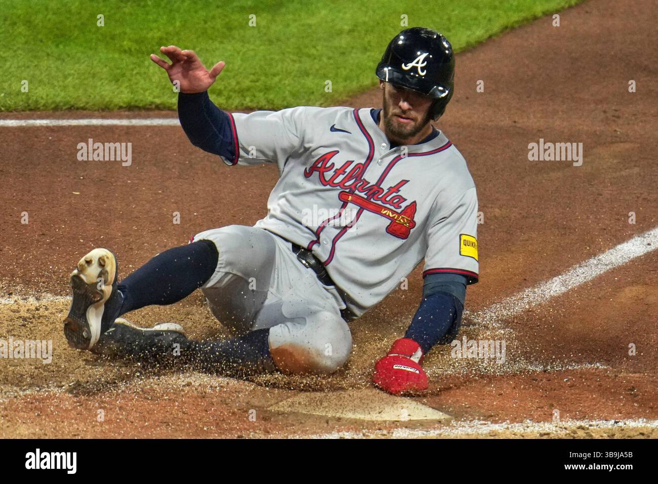 Atlanta Braves' Eli White scores on a sacrifice fly by Michael Harris ...