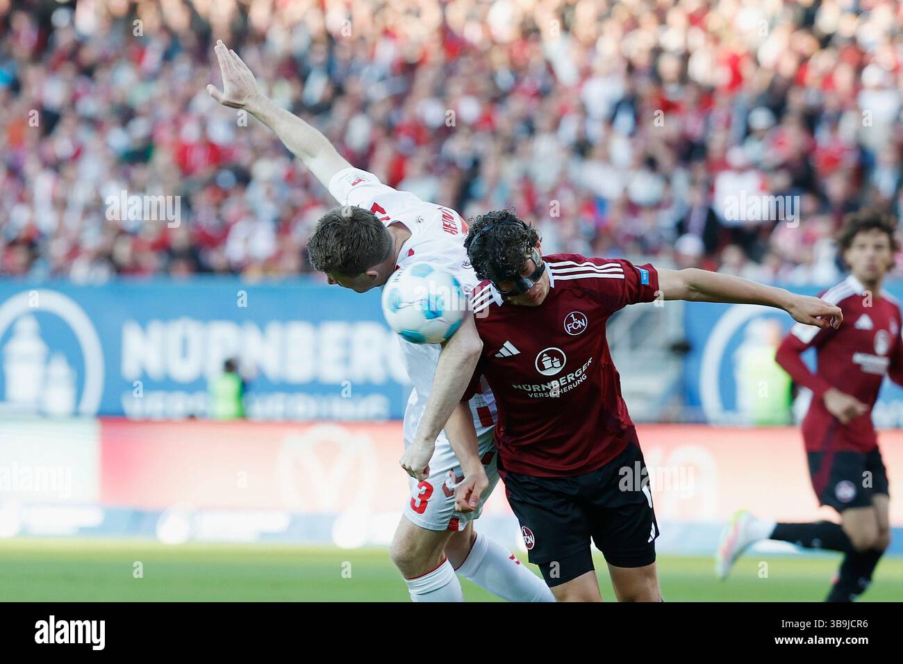 Nuernberg, Deutschland. 09th May, 2025. v.l. Dominique Heintz (1. FC Koeln, 3) und Fabio Gruber ...