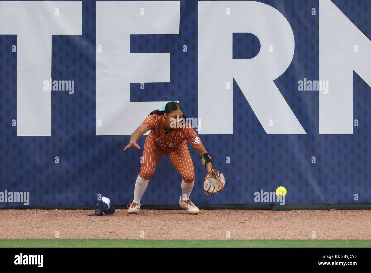 ATHENS, GA - MAY 09: Texas outfielder Kayden Henry (21) cannot control ...