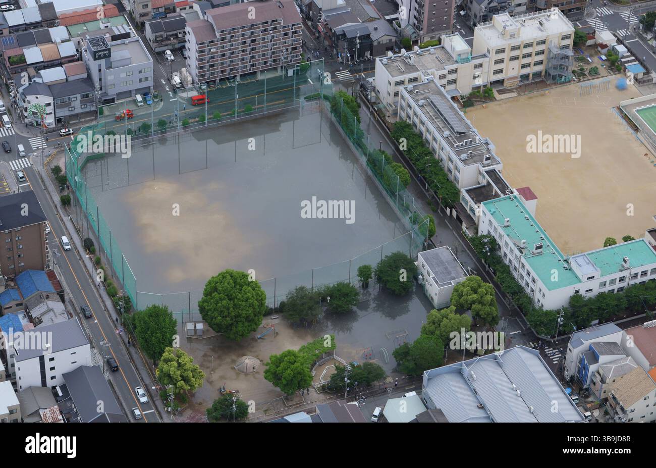 An aerial photo shows the flooded Higashi-Nakahama Park and Sports ...