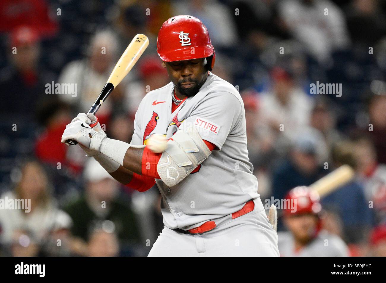 St. Louis Cardinals' Jordan Walker is hit by a pitch by Washington ...