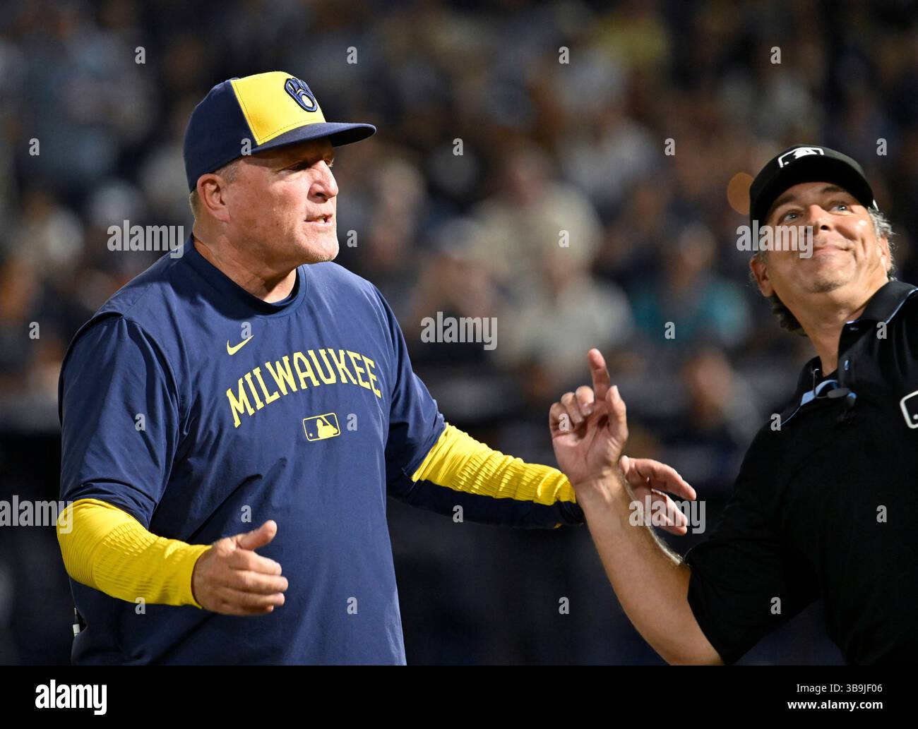 Milwaukee Brewers manager Pat Murphy, left, is tossed out of a baseball ...