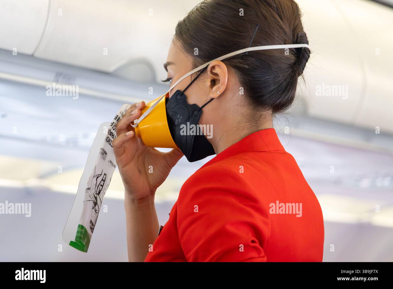 BANGKOK, THAILAND, APR 24 2025, Stewardess on board the plane before ...