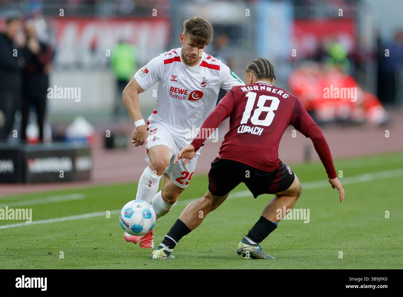 Nuernberg, Deutschland. 09th May, 2025. v.l. Jan Thielmann (1. FC Koeln, 29) und Rafael Lubach ...