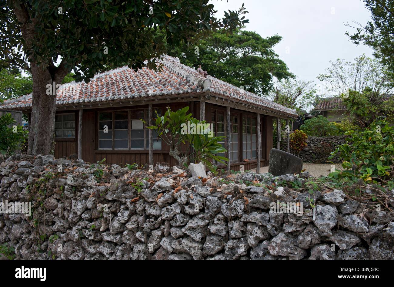 Typical single-story, single-family residence on Taketomi Island with ...