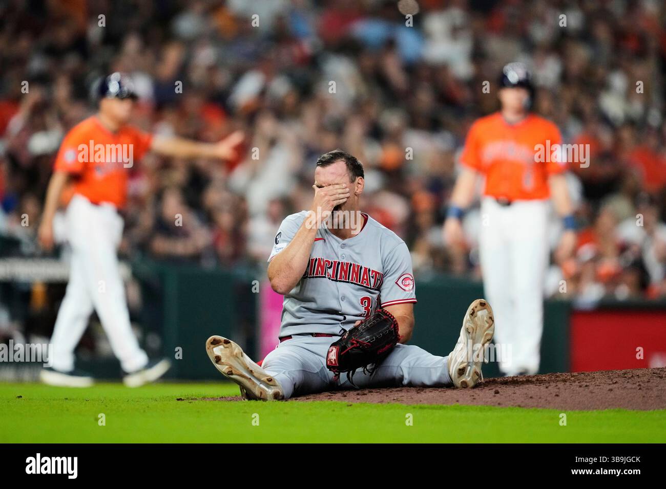 Cincinnati Reds relief pitcher Brent Suter (31) reacts as Houston ...