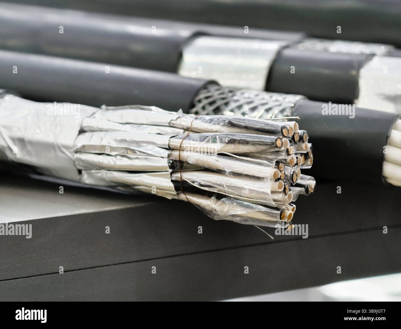 Power cables and electrical wires neatly arranged, ready for ...