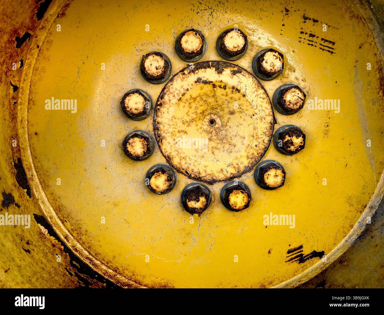 closeup of wheel hub and lug nuts of tractor Stock Photo - Alamy