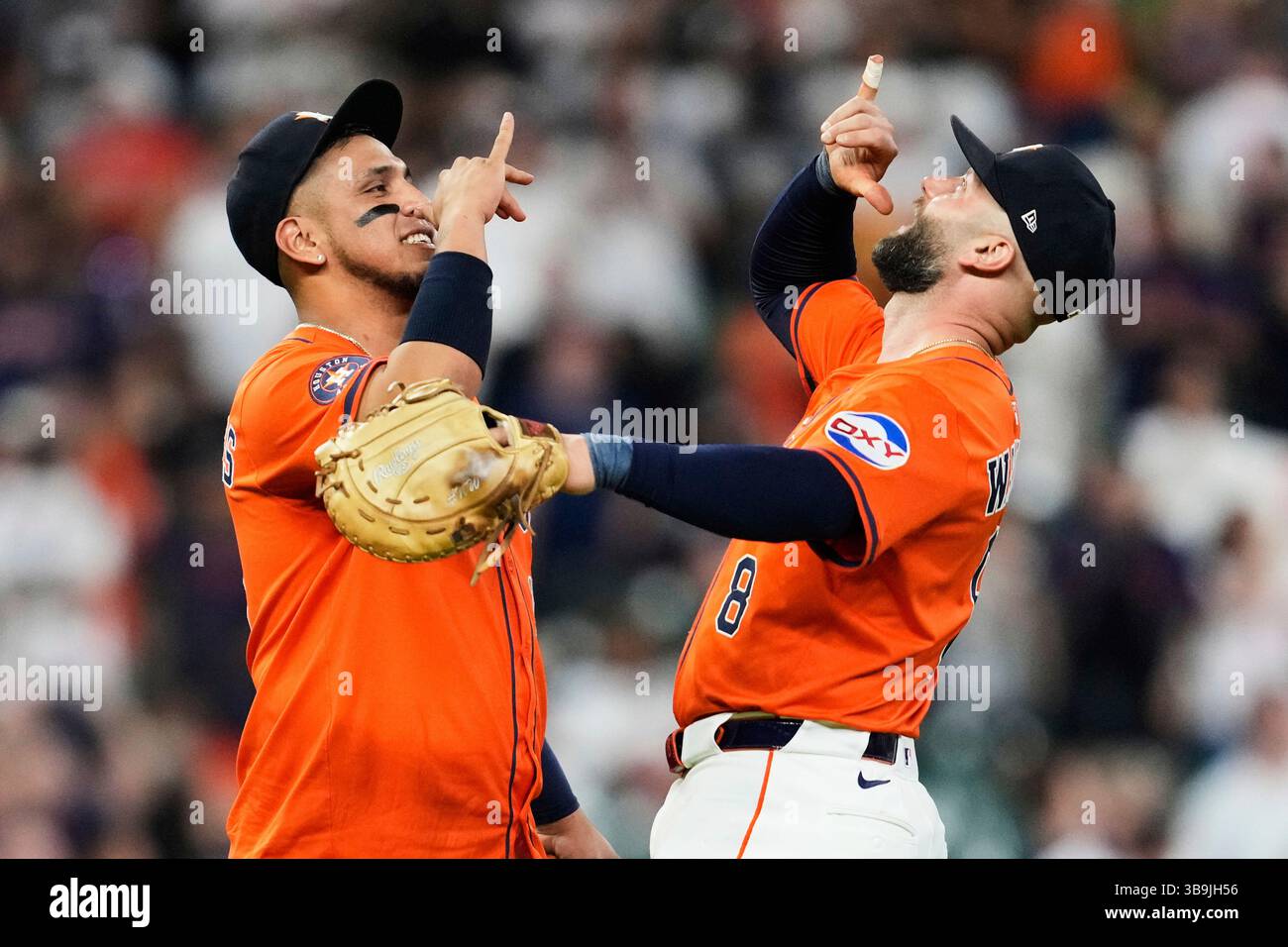 Houston Astros third baseman Isaac Paredes, left, and first baseman ...