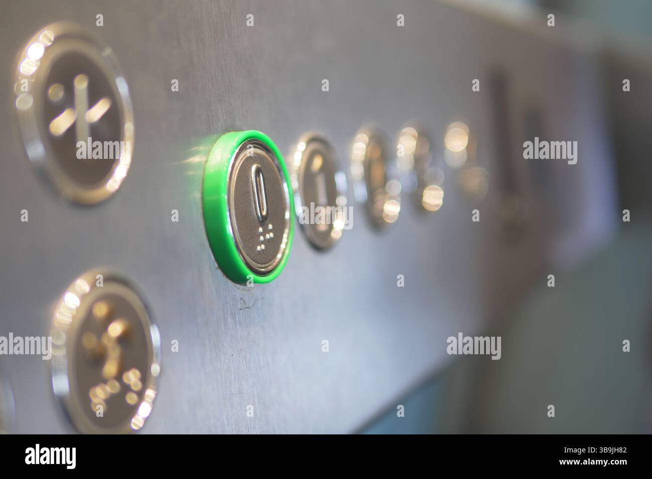 Elevator control panel with illuminated button in modern building Stock ...