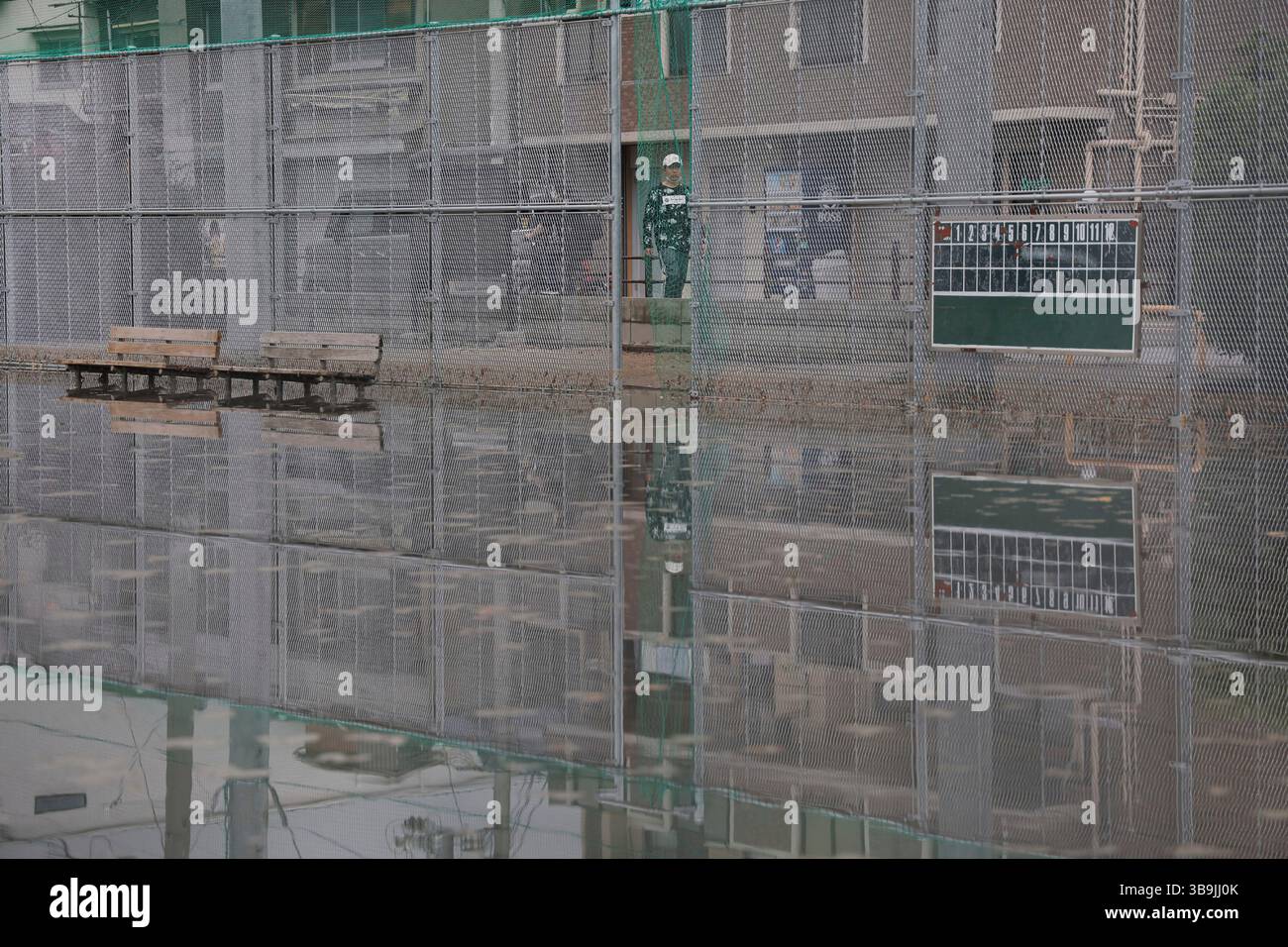 A photo shows the flooded Higashi-Nakahama Sports Ground after a water ...