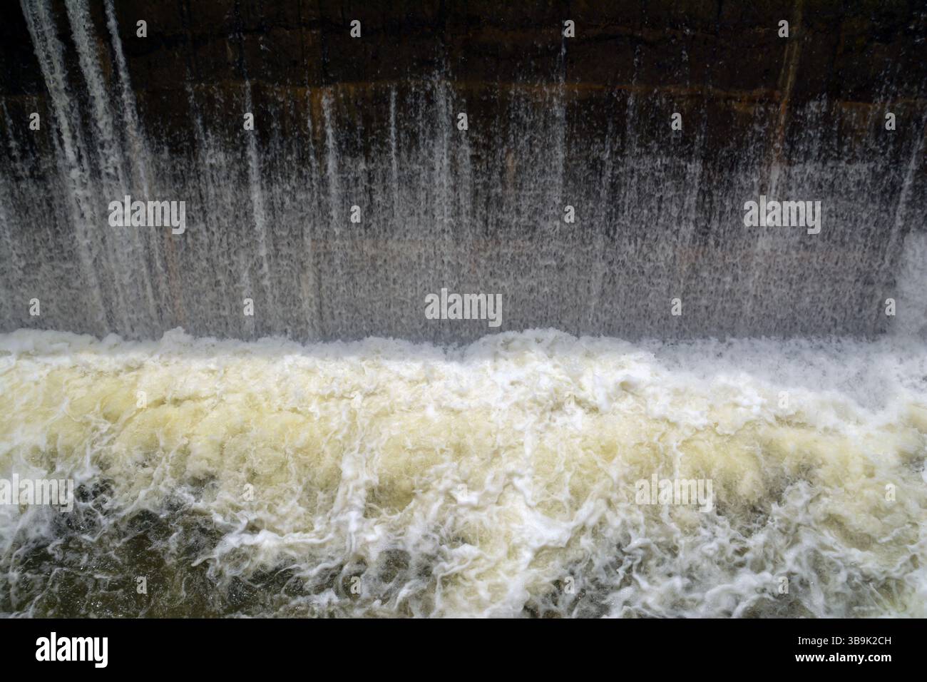 Reservoir and dam. Lighthouse in the reservoir. Lake in the mountains ...