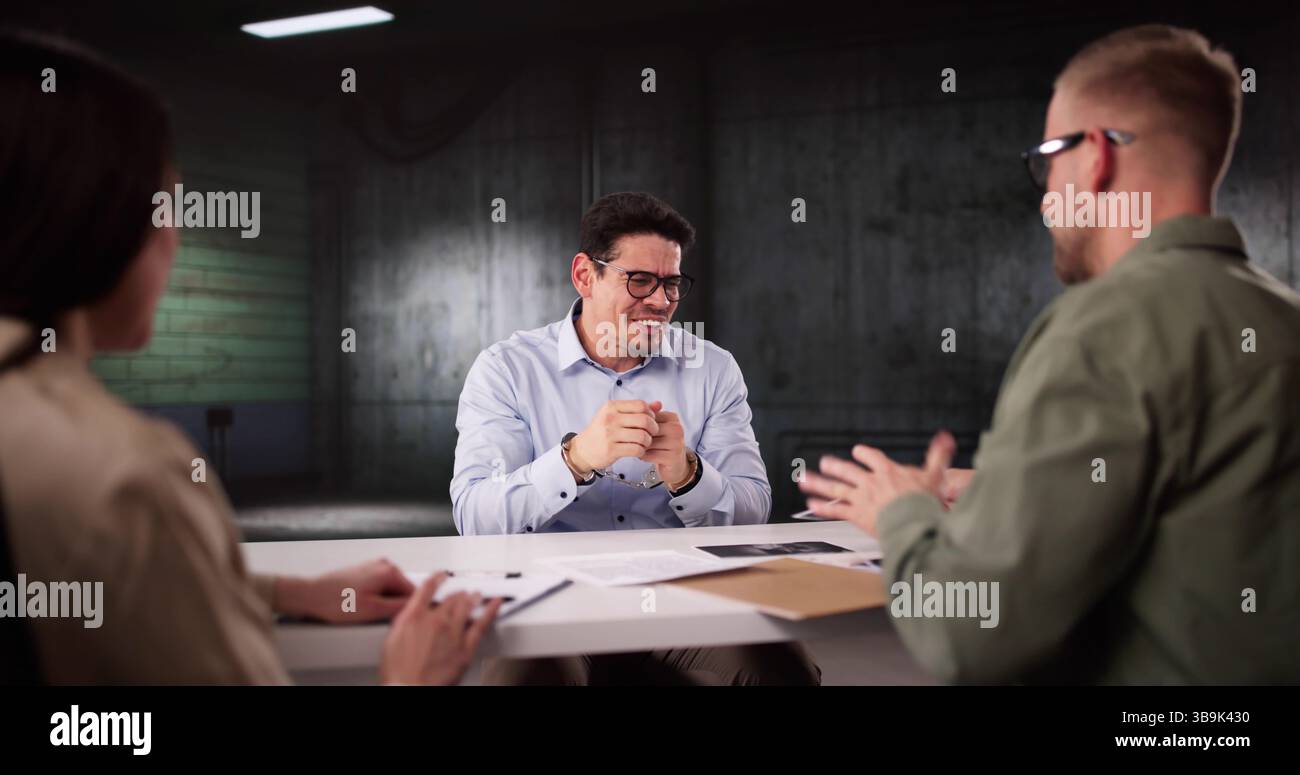 Defiant Criminal Defense Attorney Confronts Police Investigator In Interrogation Room Stock ...