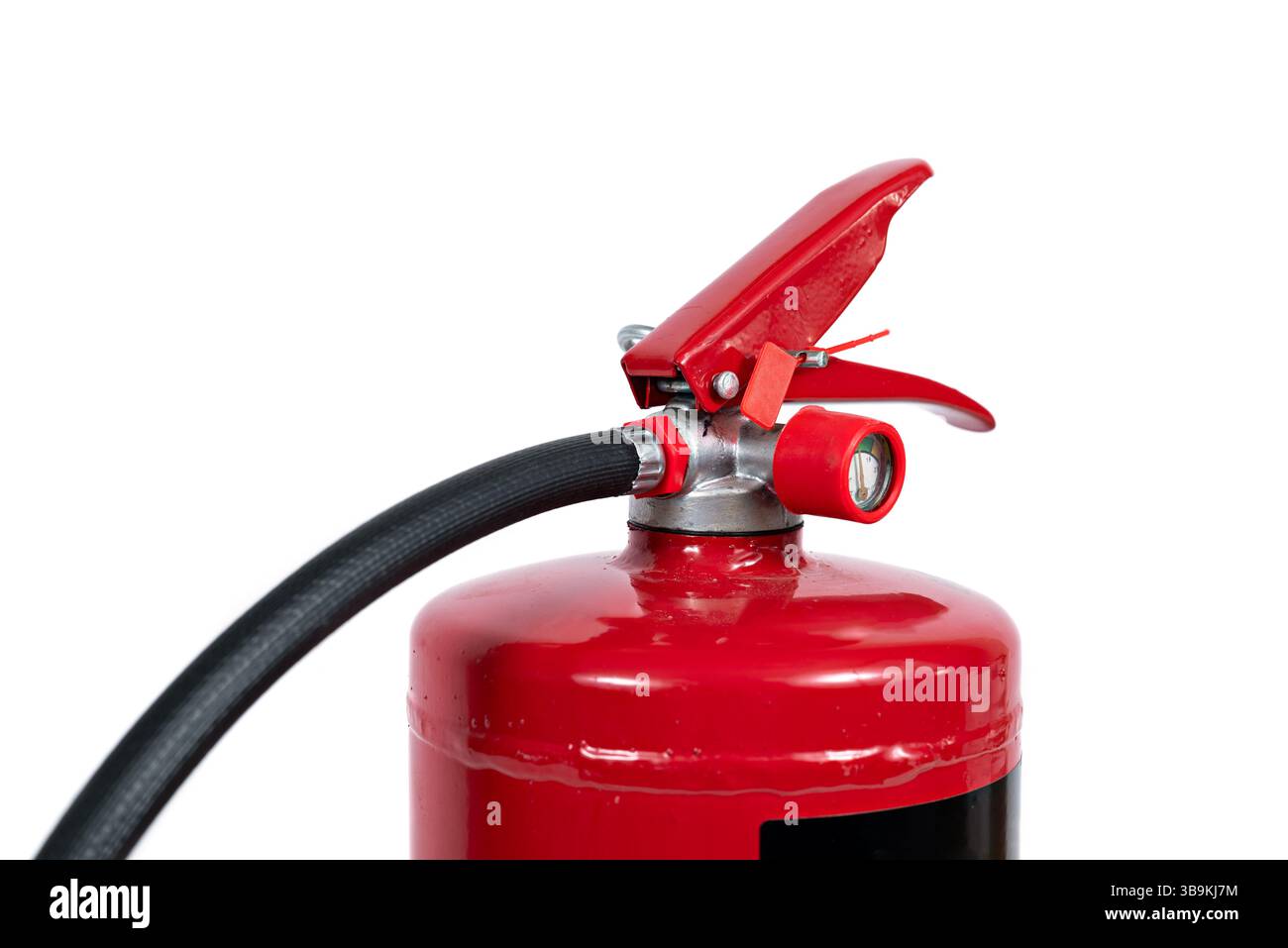 A red cylinder fire extinguisher with a black hose, contrasting on a ...