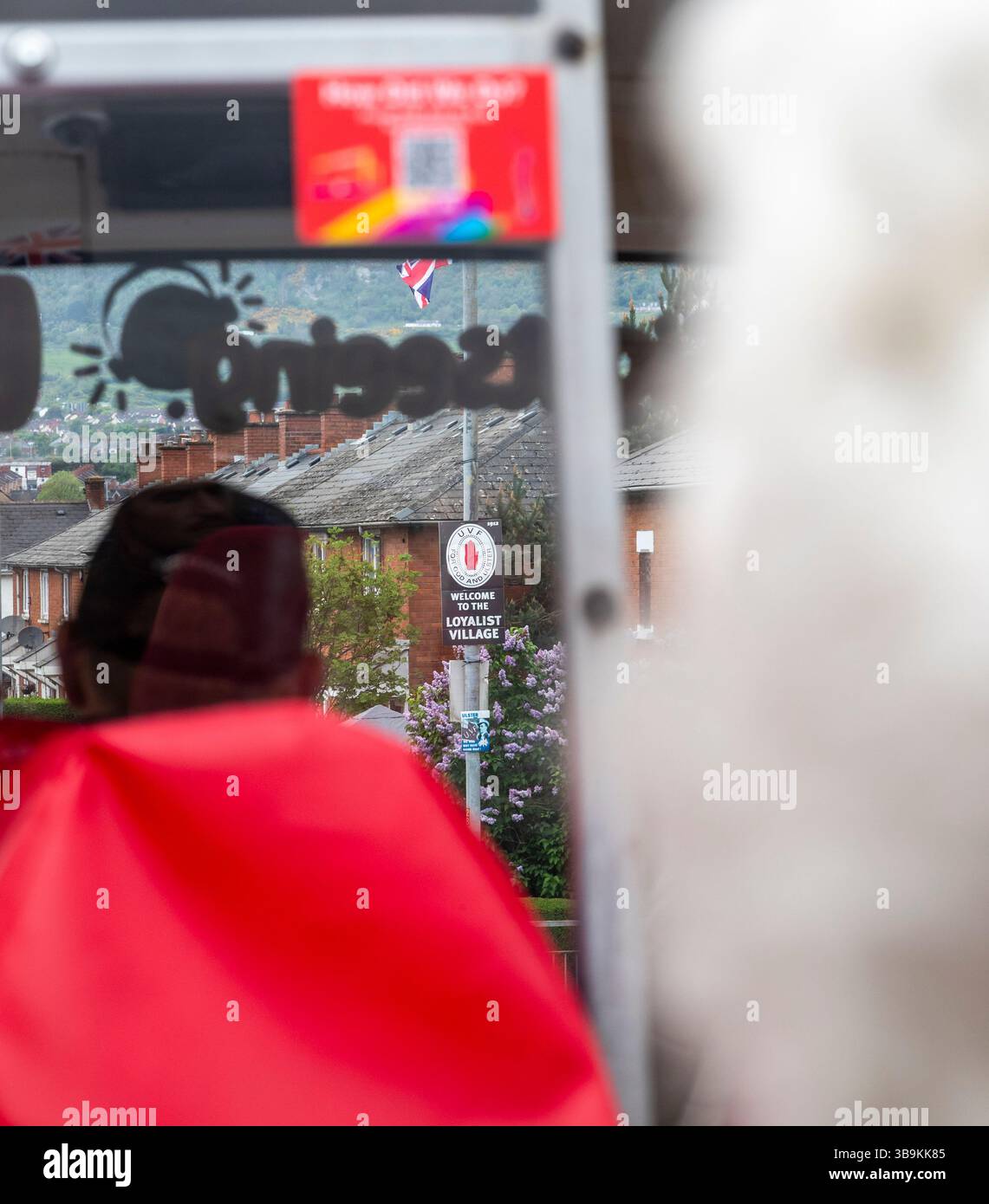 The Loyalist Village sign seen through the windows of the Red Bus ...