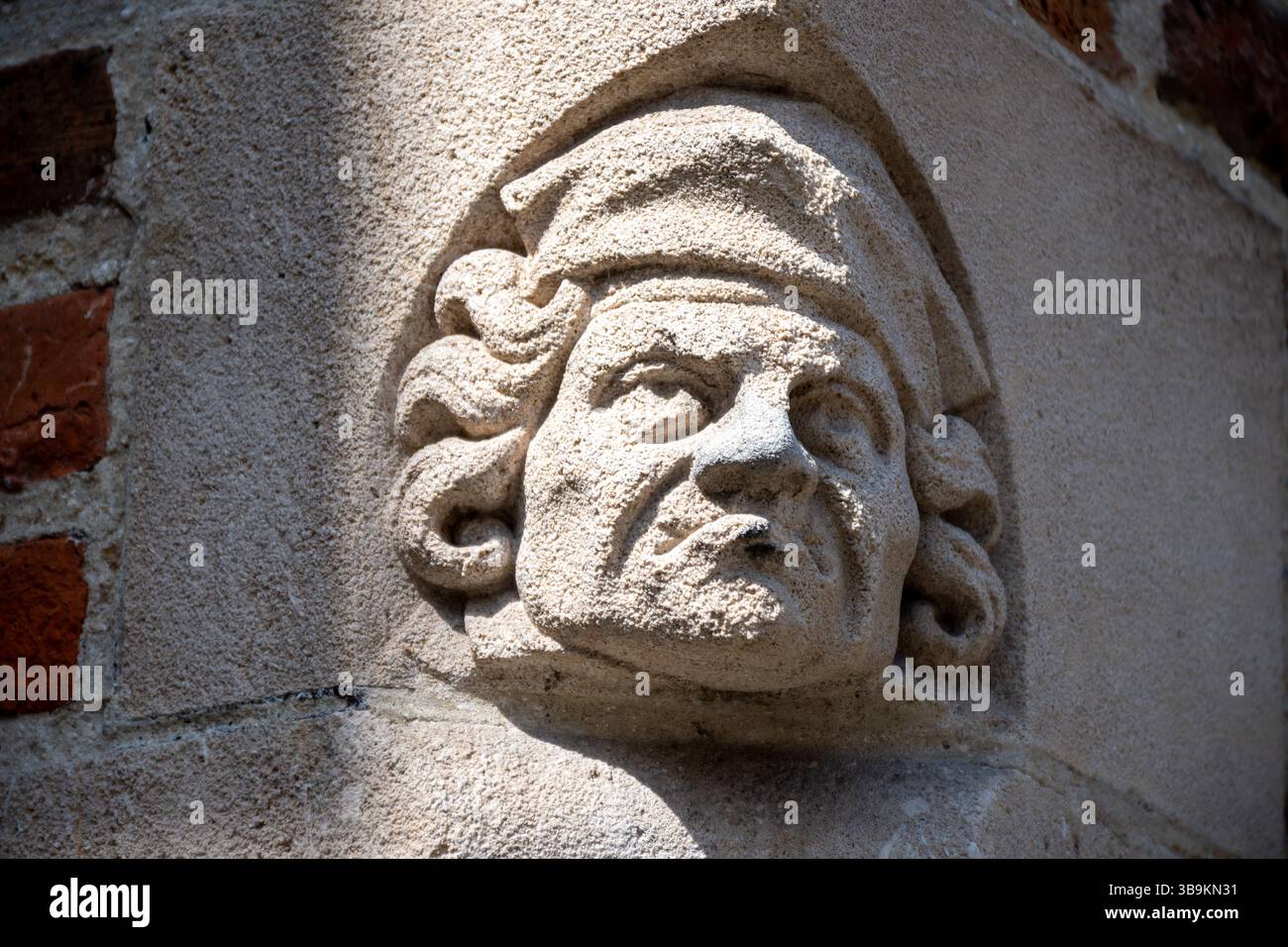 Decor detail man face of medieval houses facades in the centre of ...