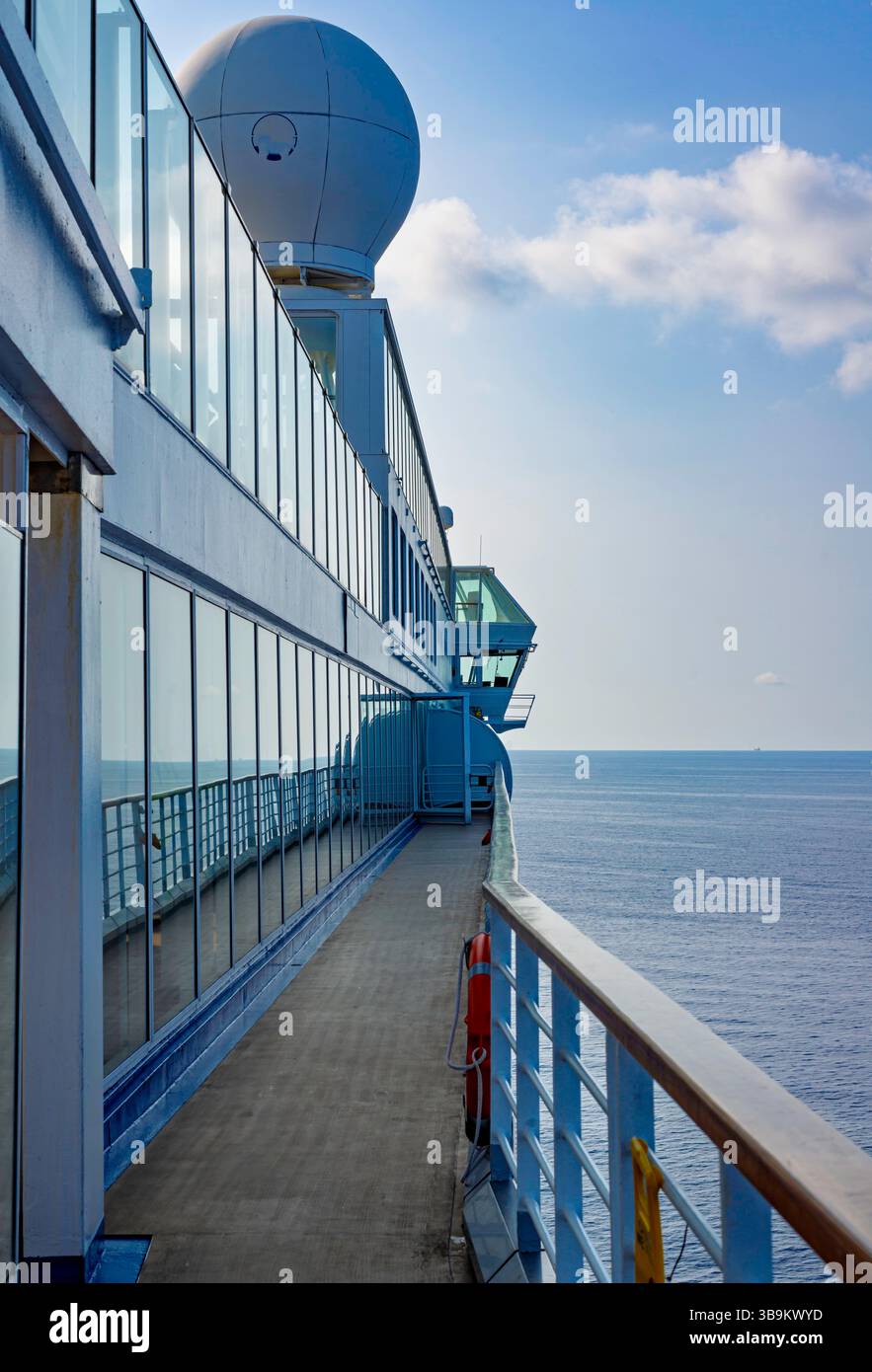 Curved modern walkway on a ship deck. Clean lines, reflective windows ...