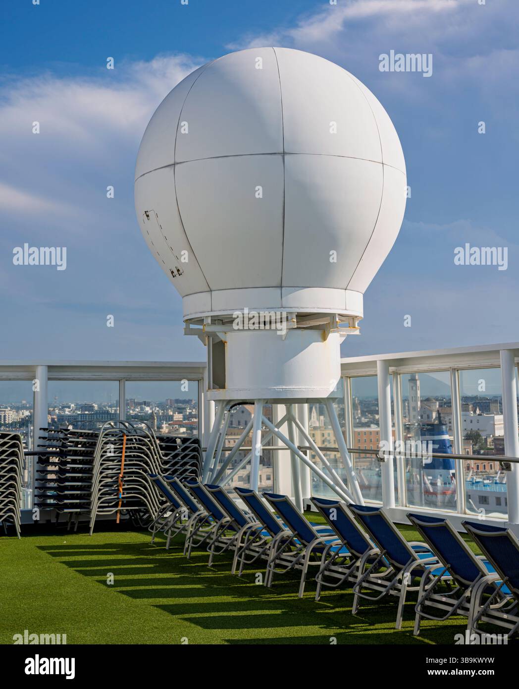 Large white satellite dome on a cruise ship deck. Stacked and lined ...
