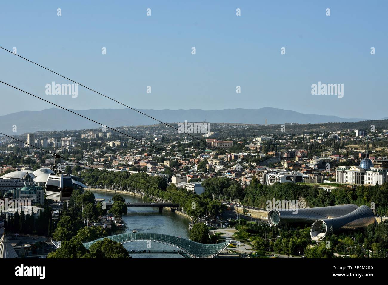 view of famous tourist attractions of Tbilisi city: glass bridge ...