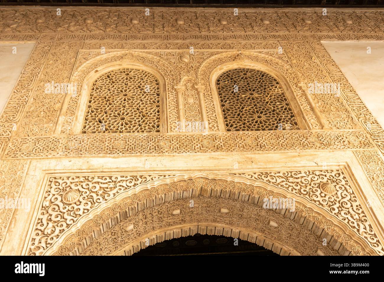 Carved decoration of the walls in the Alhambra with the elements of ...