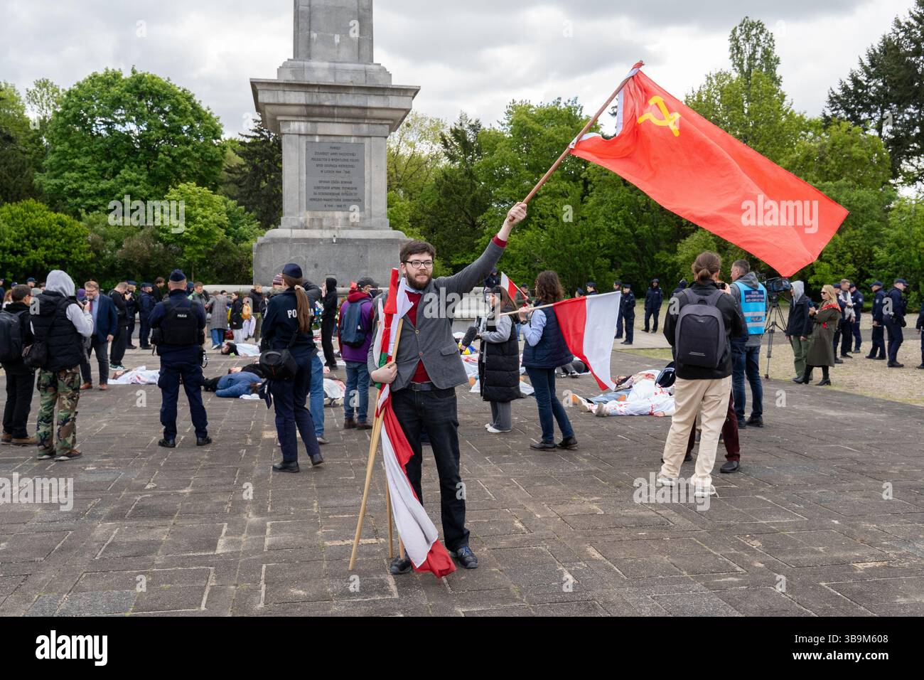A man waves a Soviet Union flag as he takes part in the 80th ...