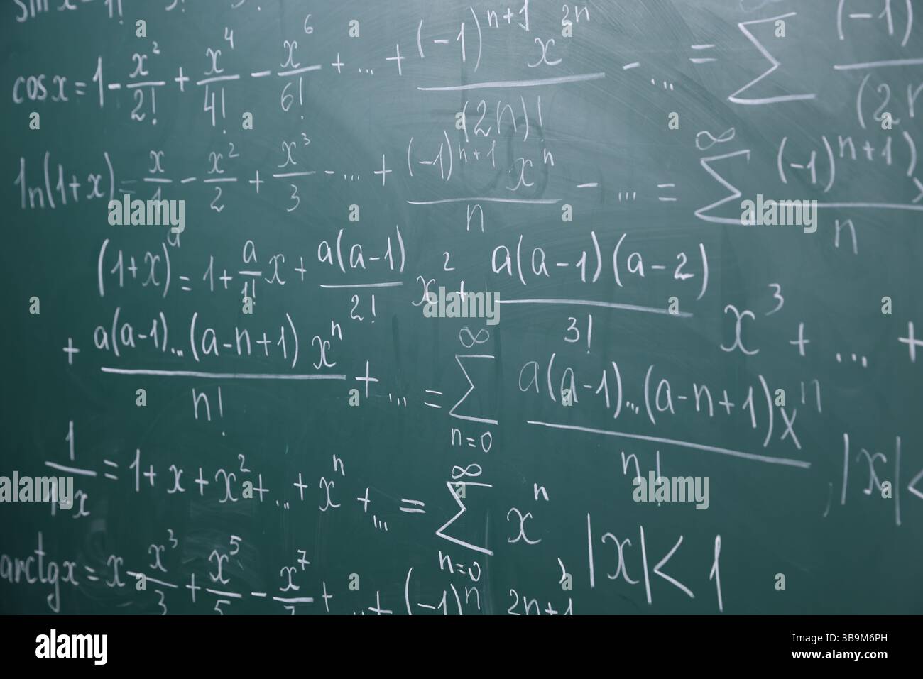 Different formulas written with chalk on blackboard Stock Photo - Alamy