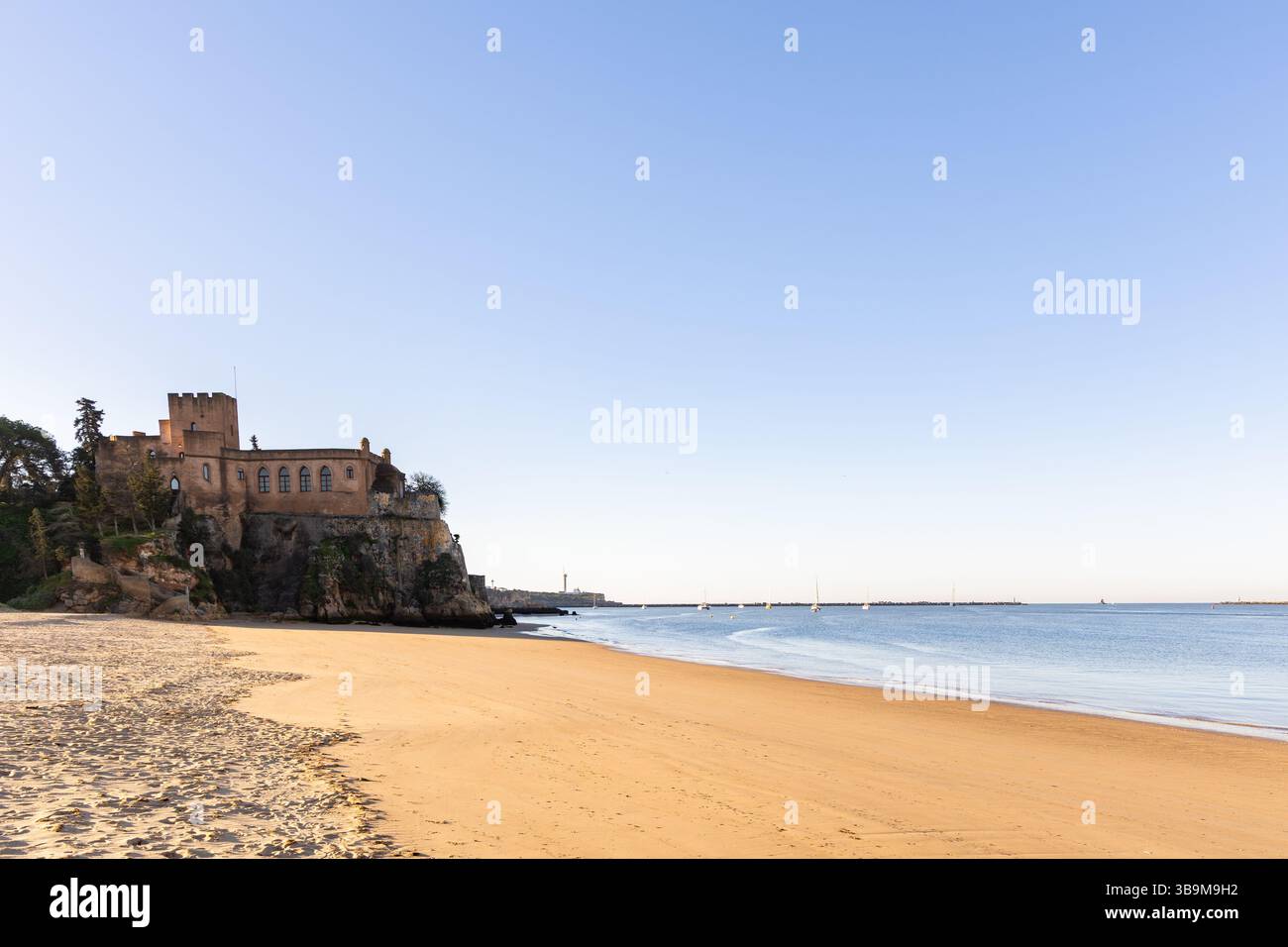 A castle in the middle of the beach. A historic building that protects ...