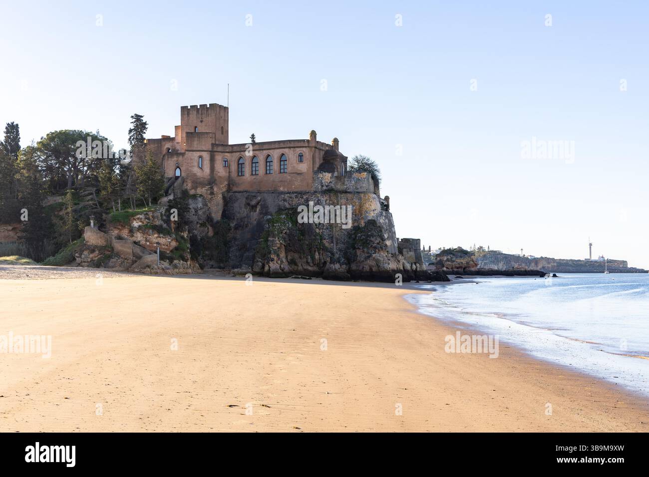 A castle in the middle of the beach. A historic building that protects ...