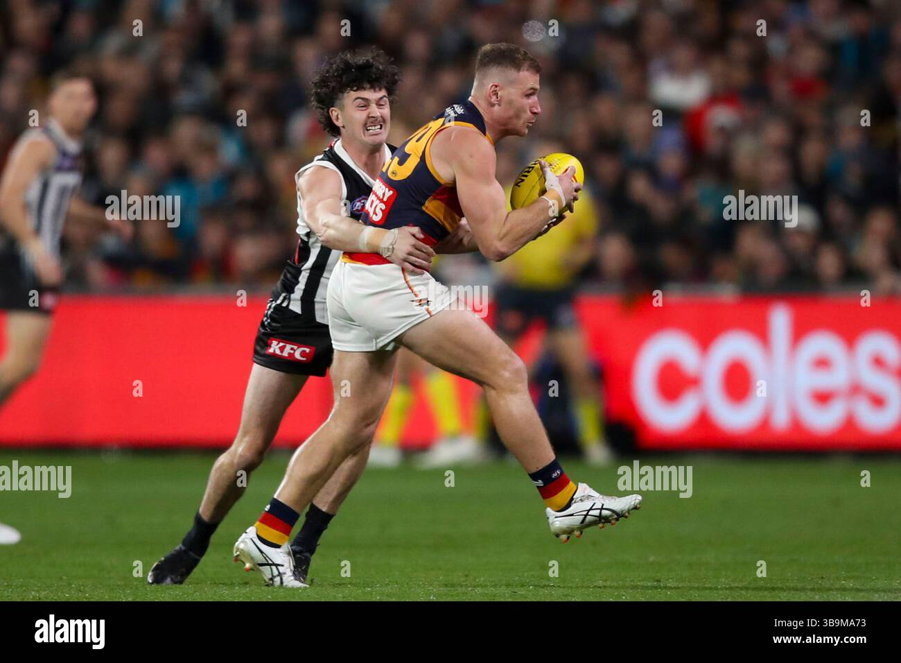Adelaide, Australia. 10th May, 2025. Rory Laird of the Crows is tackled ...
