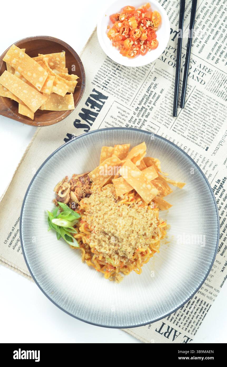 Indonesian Fried Noodles dish, mie goreng, cooked with spicy spices and ...