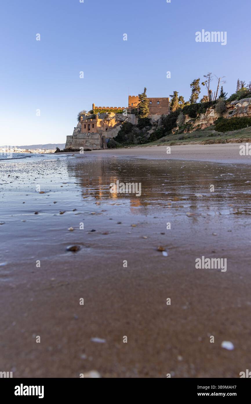 A castle in the middle of the beach. A historic building that protects ...
