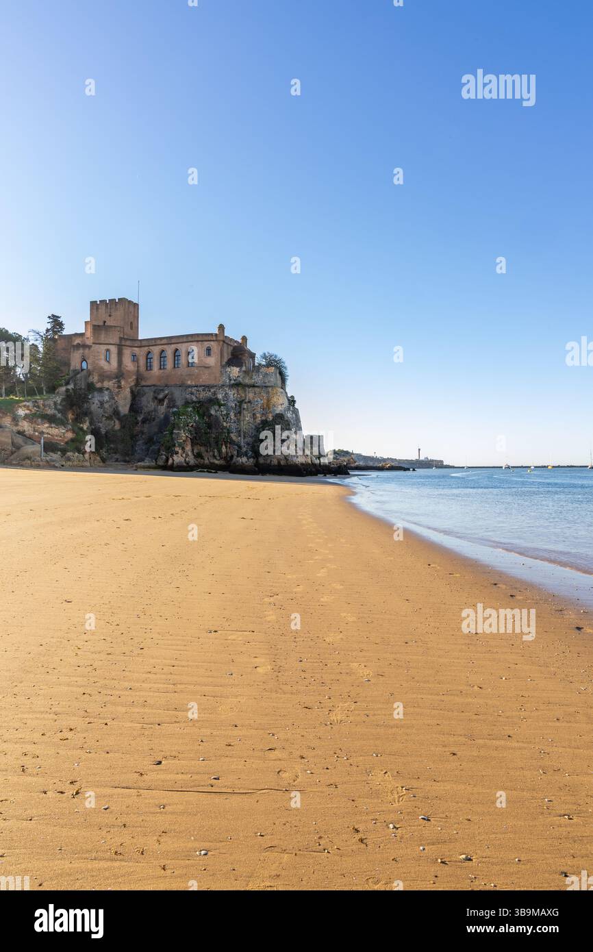 A castle in the middle of the beach. A historic building that protects ...