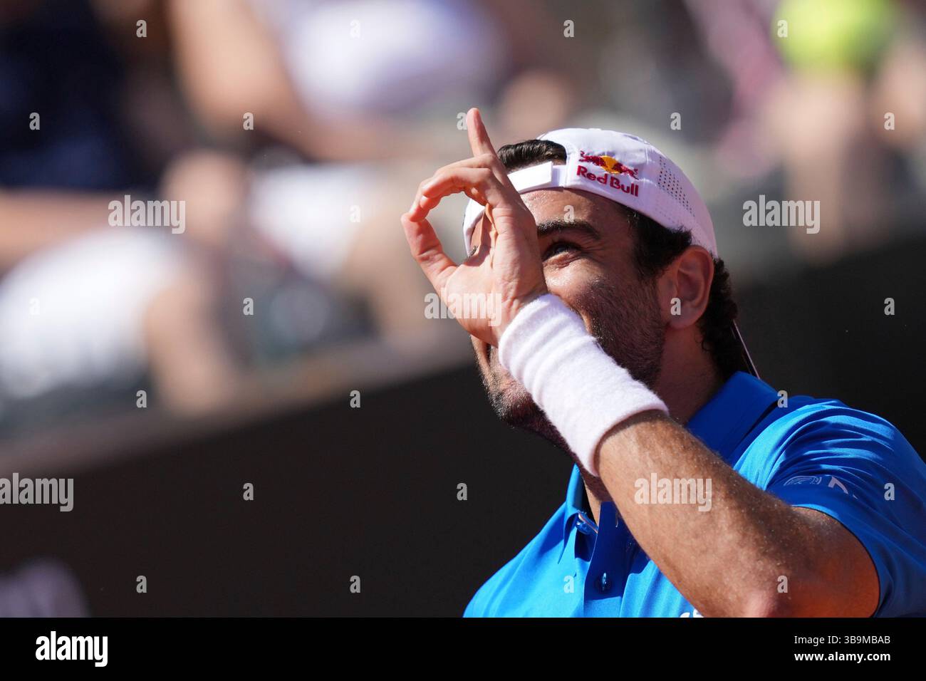 Italy's Matteo Berrettini reacts as he plays Britain's Jacob Fearnley ...