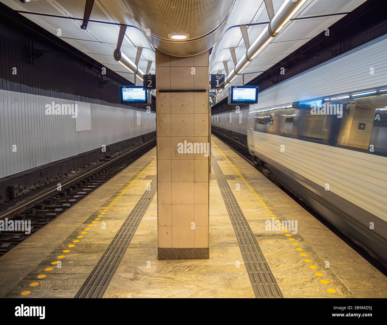 Copenhagen, Denmark - March 23rd 2025: A modern subway station with two ...