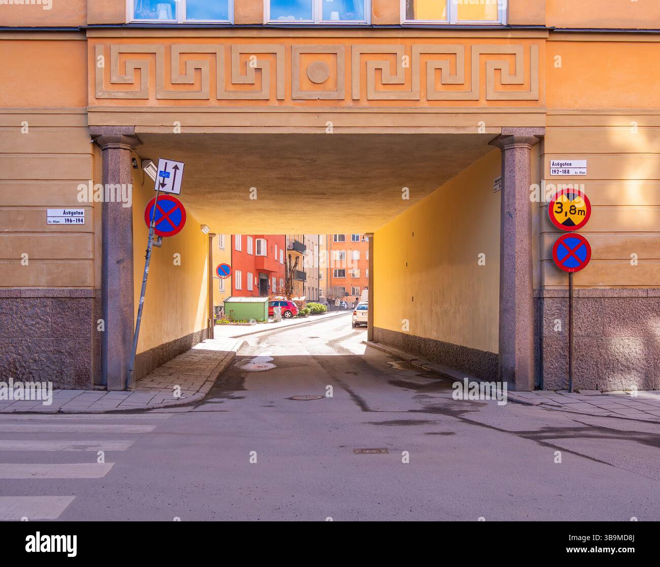 Stockholm, Sweden - March 28th 2025: A street view featuring an archway ...