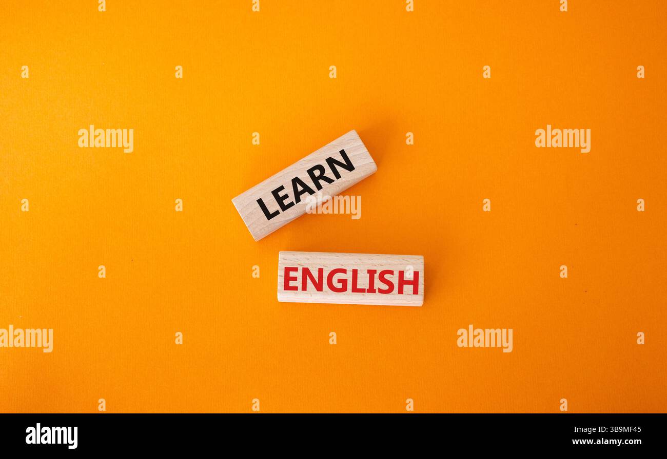 Learn English symbol. Wooden blocks with words Learn English. Beautiful ...