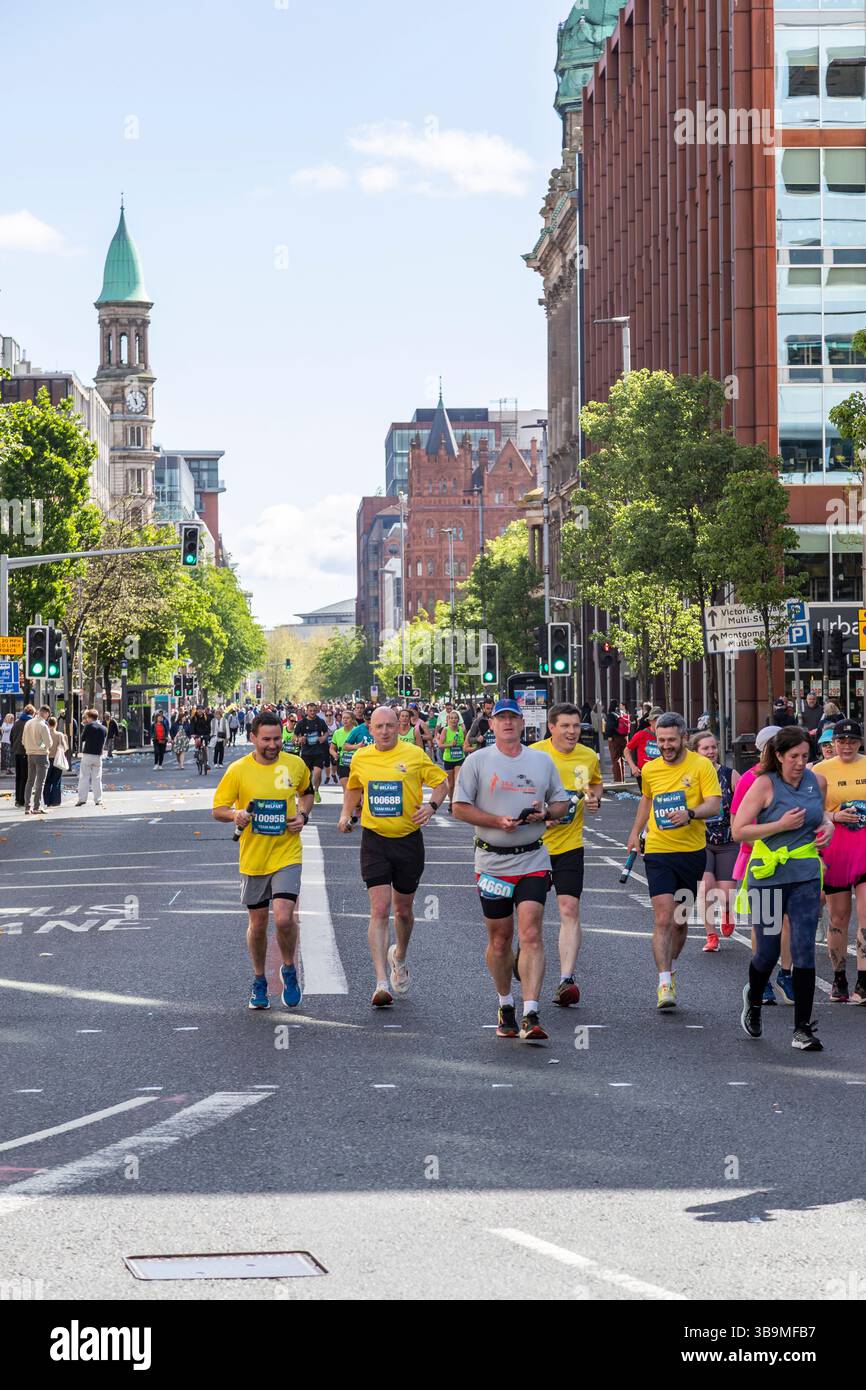 Runners in the Belfast Marathon. Great Victoria Street, Belfast Stock ...