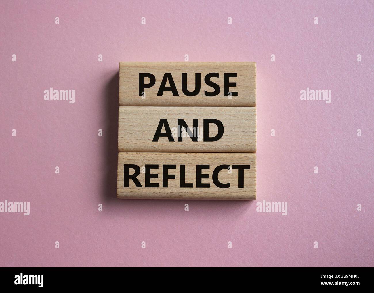 Pause and Reflect symbol. Concept words Pause and Reflect on wooden ...