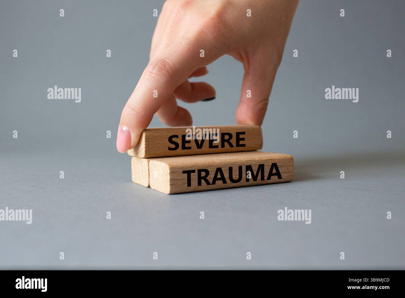 Severe trauma symbol. Wooden blocks with words Severe trauma. Beautiful ...