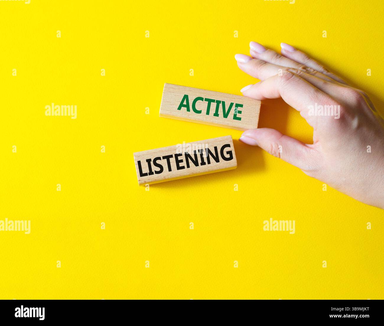 Active listening symbol. Wooden blocks with words Active listening ...