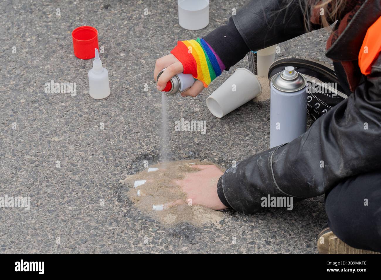 A member of the Ostatnie Pokolenie (Last Generation) climate activism ...