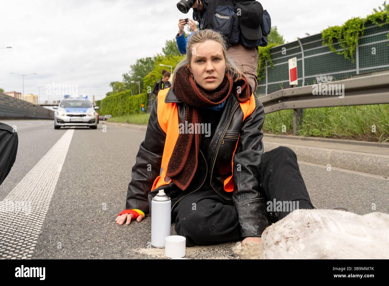 A member of the Ostatnie Pokolenie (Last Generation) climate activism ...