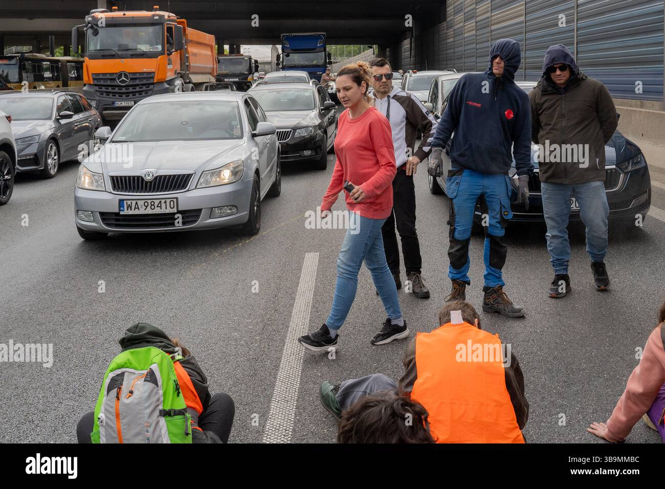 A driver uses pepper spray against members of the Ostatnie Pokolenie ...
